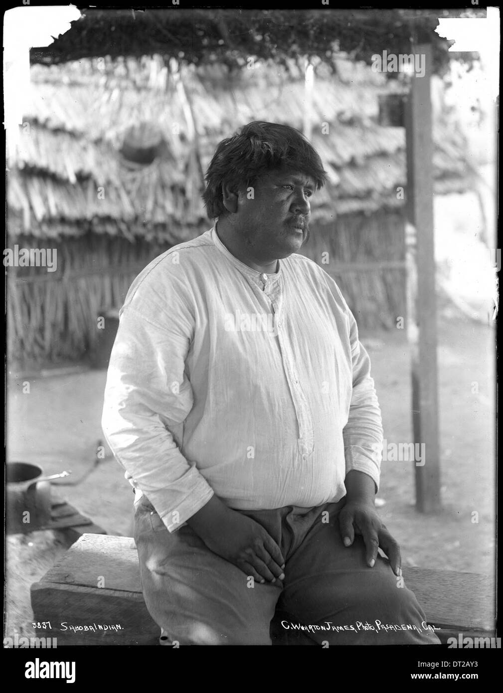 A photograph of a large Soboba Indian man sitting outside, circa 1900 ...