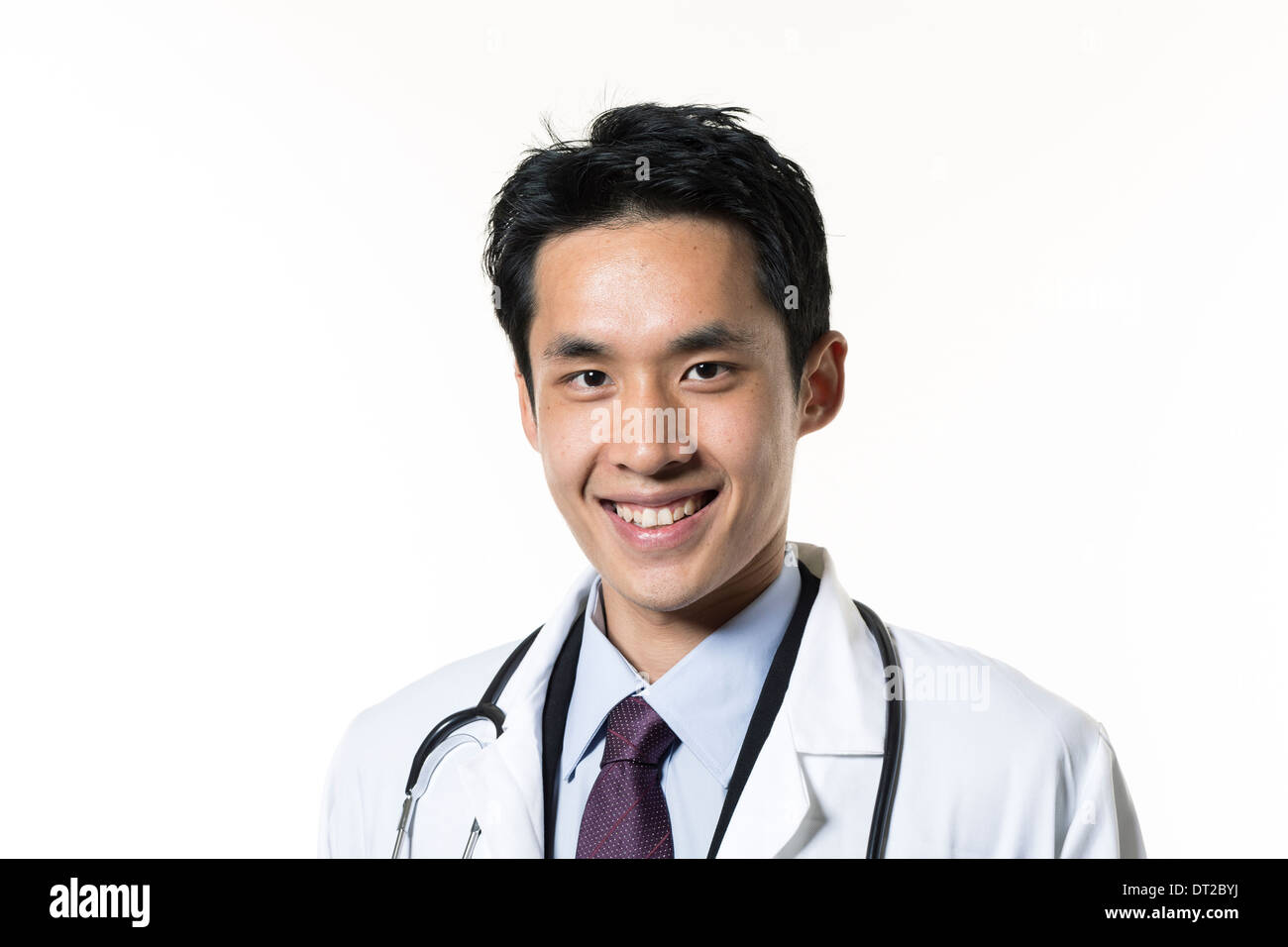 Portrait of a Male Asian doctor wearing white coat and stethoscope ...