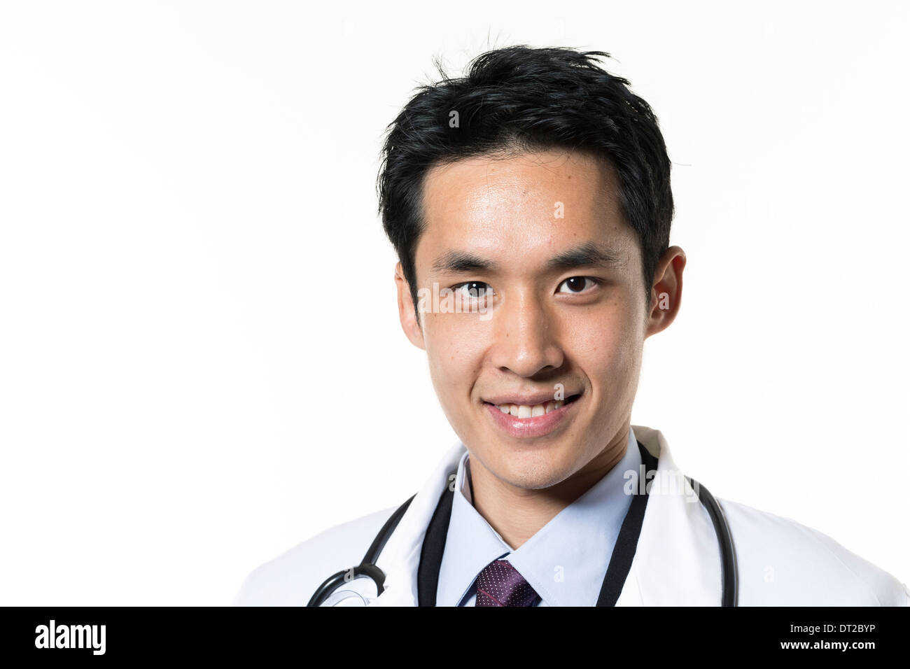 Portrait of a Male Asian doctor wearing white coat and stethoscope ...