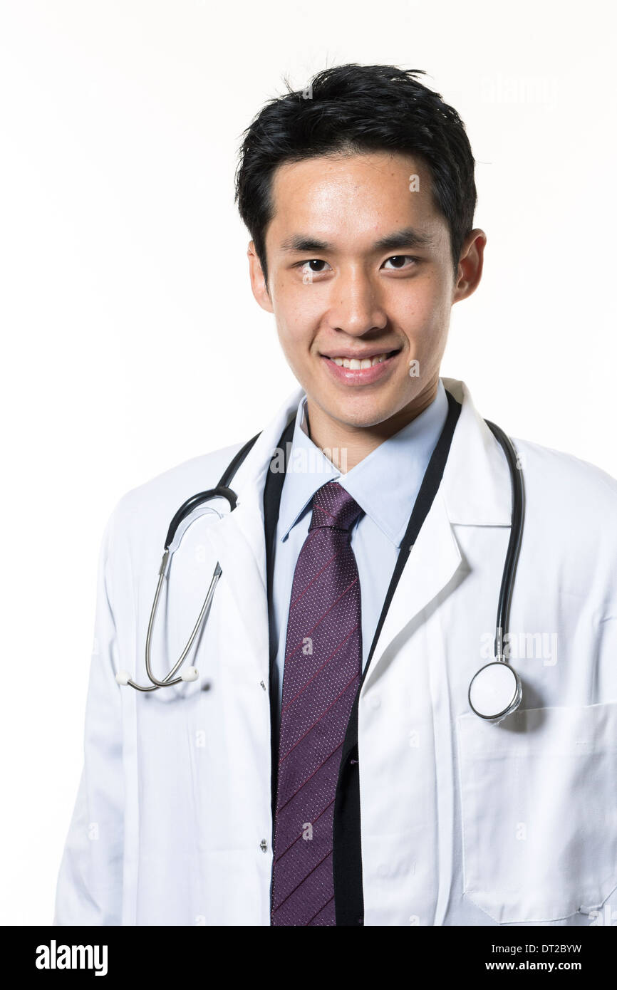 Portrait of a Male Asian doctor wearing white coat and stethoscope ...