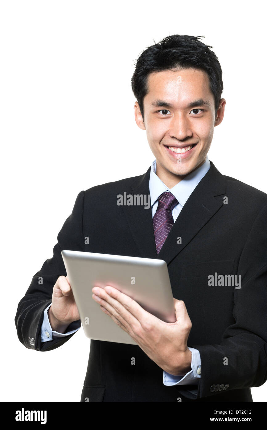 Chinese businessman with a tablet computer. Isolated on a white ...