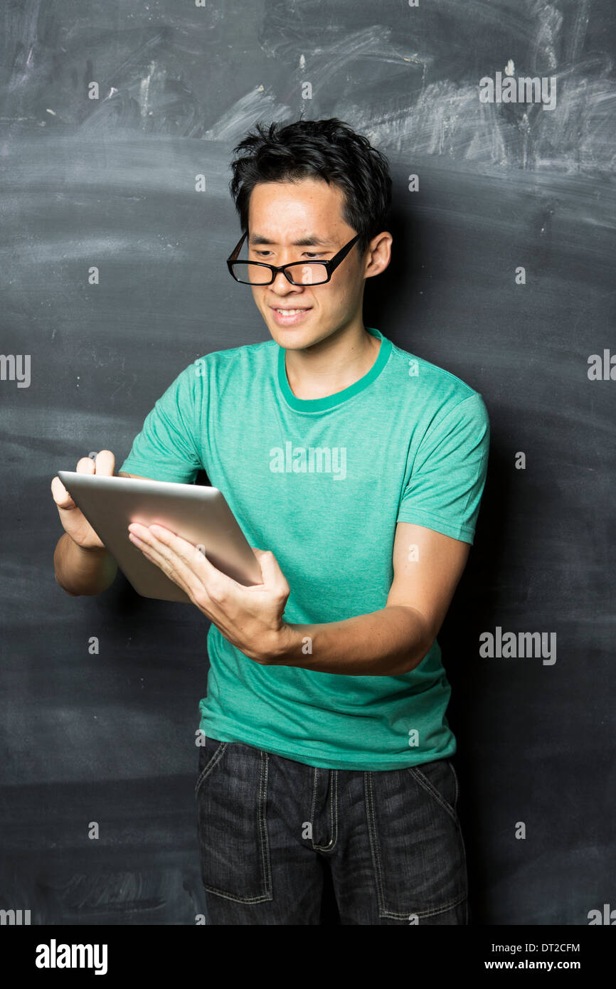 Chinese men using ipad hi-res stock photography and images - Alamy