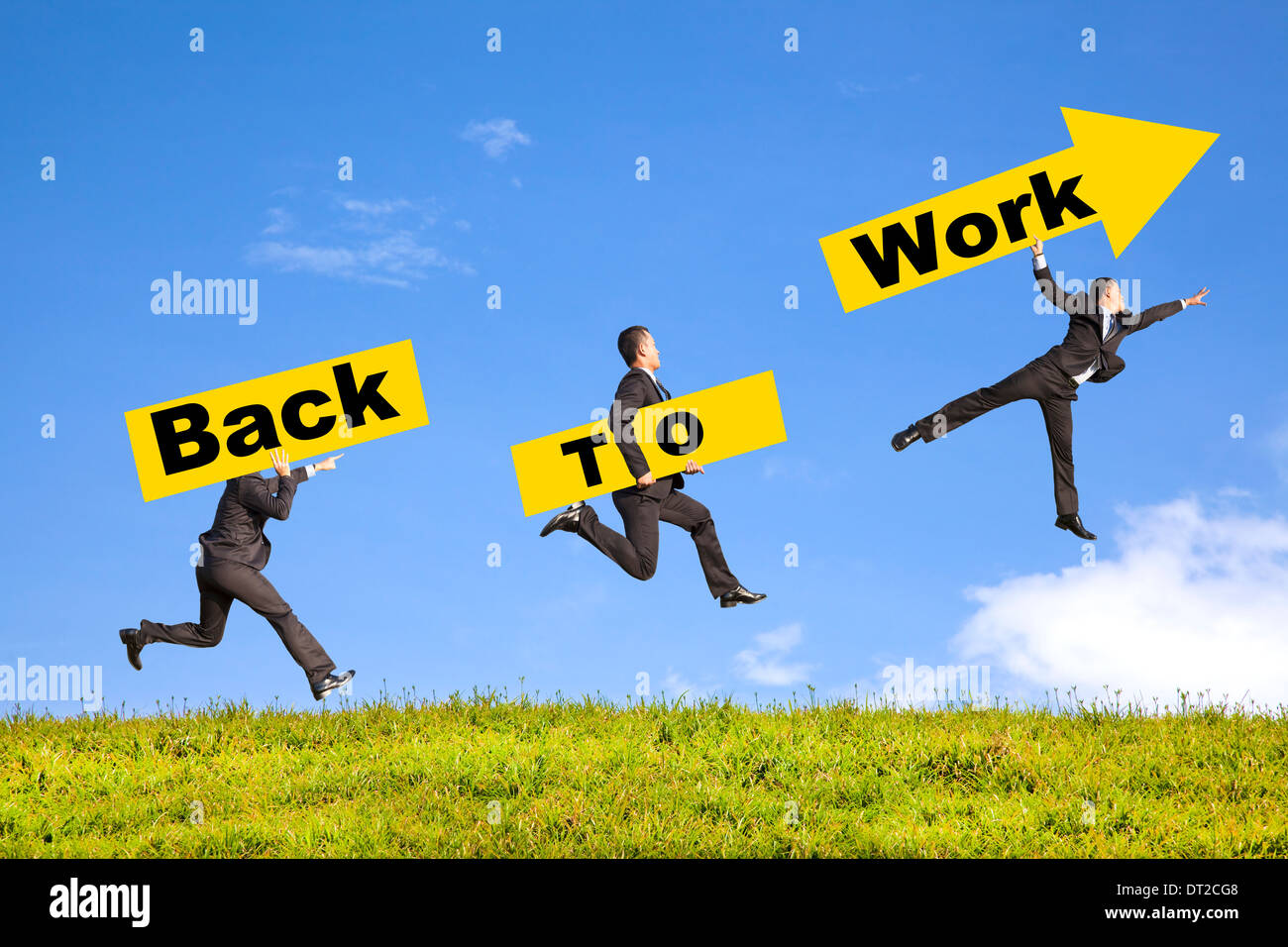 businessman holding signboard show back to work Stock Photo - Alamy