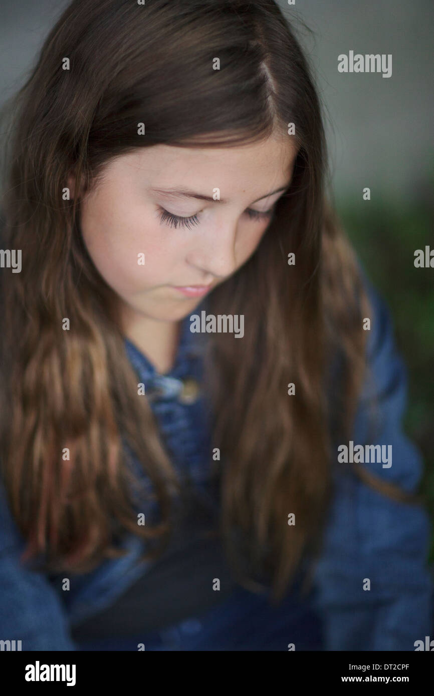 A girl looking sad Stock Photo - Alamy