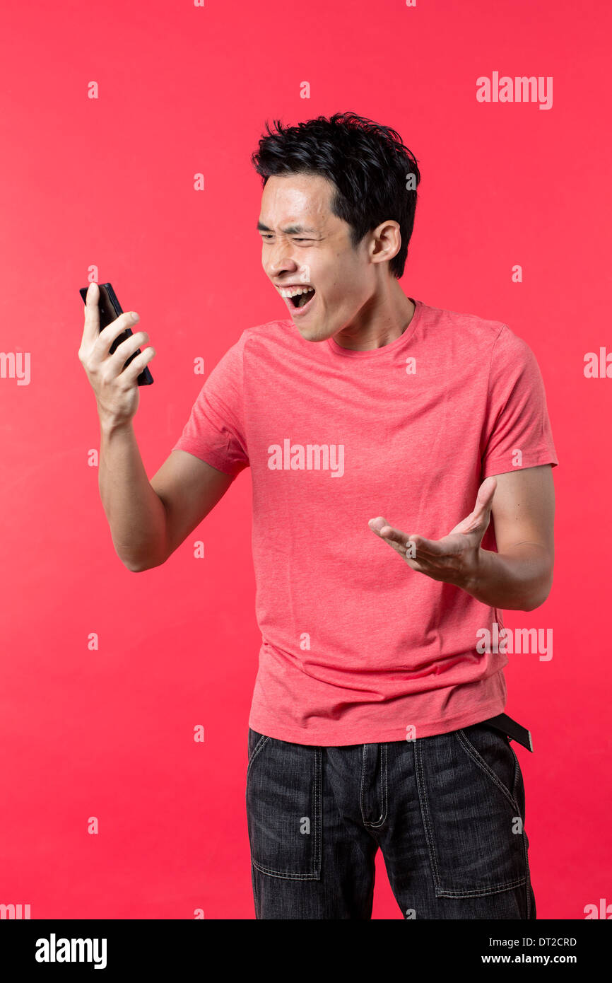 Angry chinese man hi-res stock photography and images - Alamy