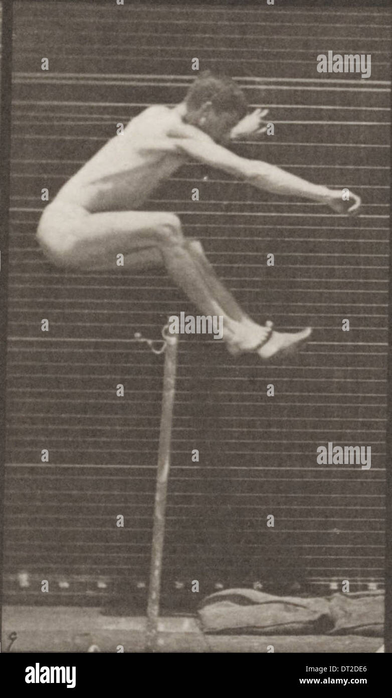 A photograph of a man dressed in pelvis cloth standing and jumping ...