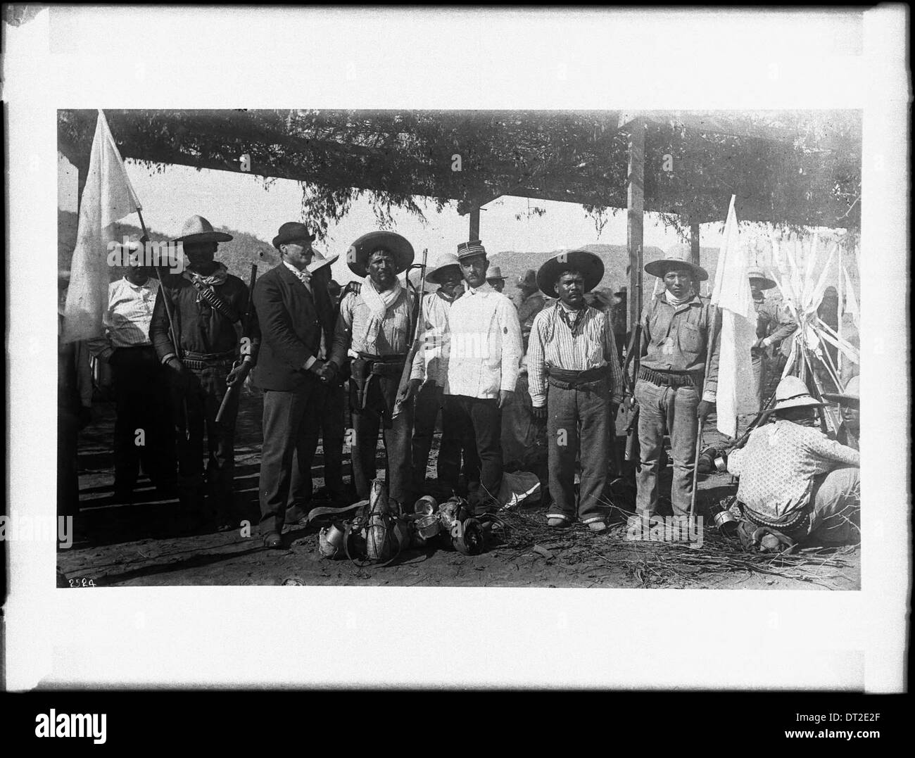 A photograph showing Mexicans and Yaqui Indians at the surrender and ...