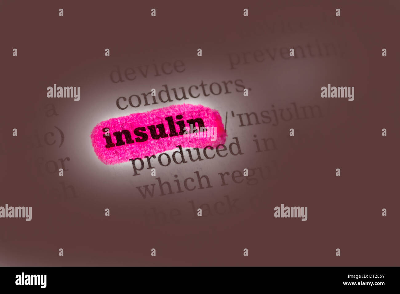 Insulin Dictionary Definition closeup highlighted in pink Stock Photo ...