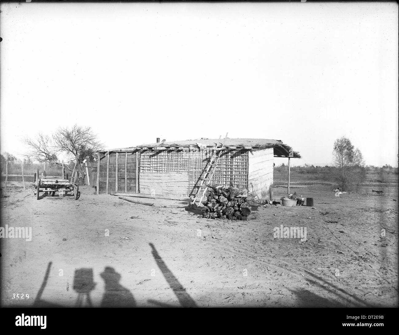 A photograph showing a Mojave Indian house under construction in Parker ...