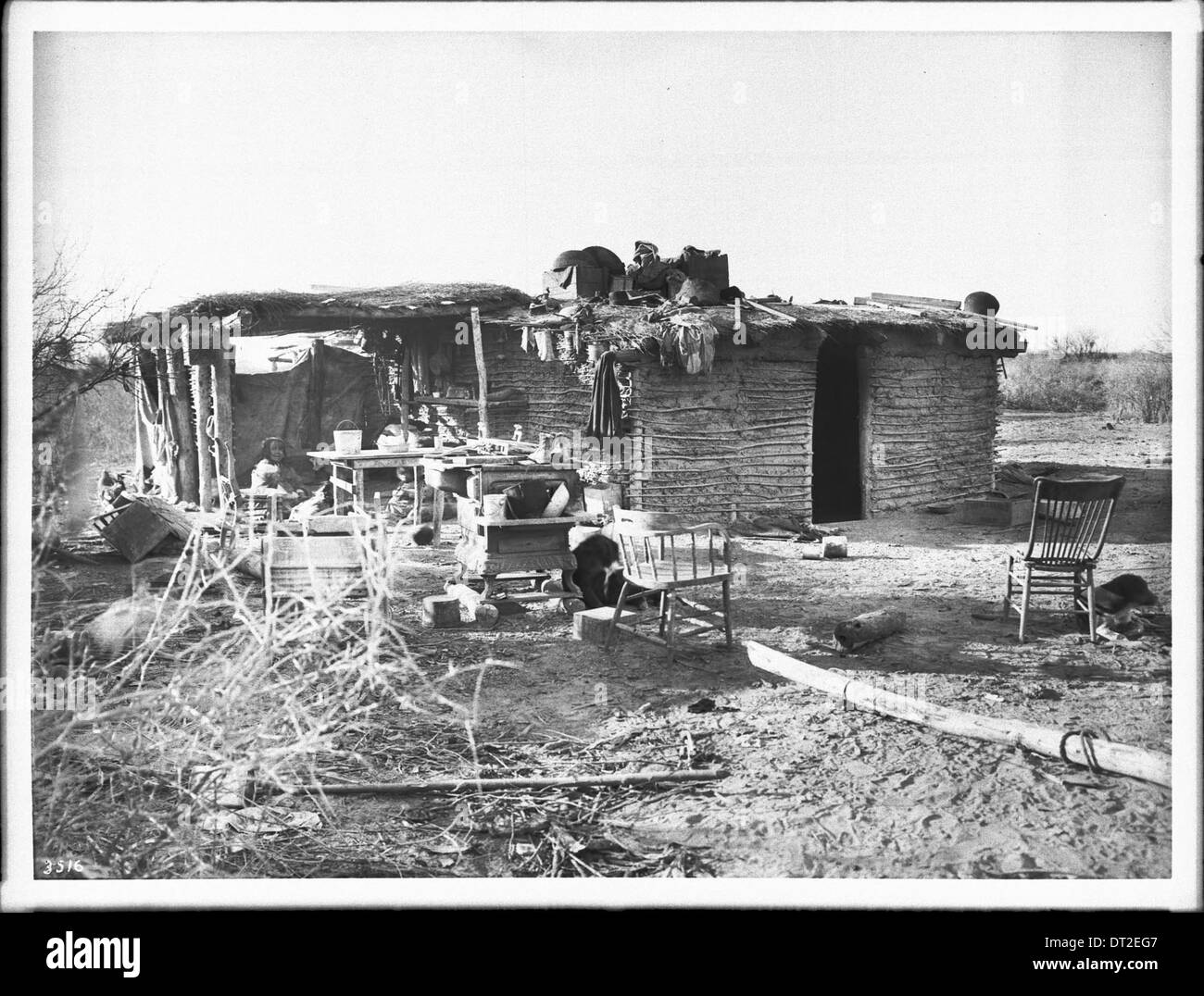 A photograph depicting a Yuma Indian woman and child inside a ...