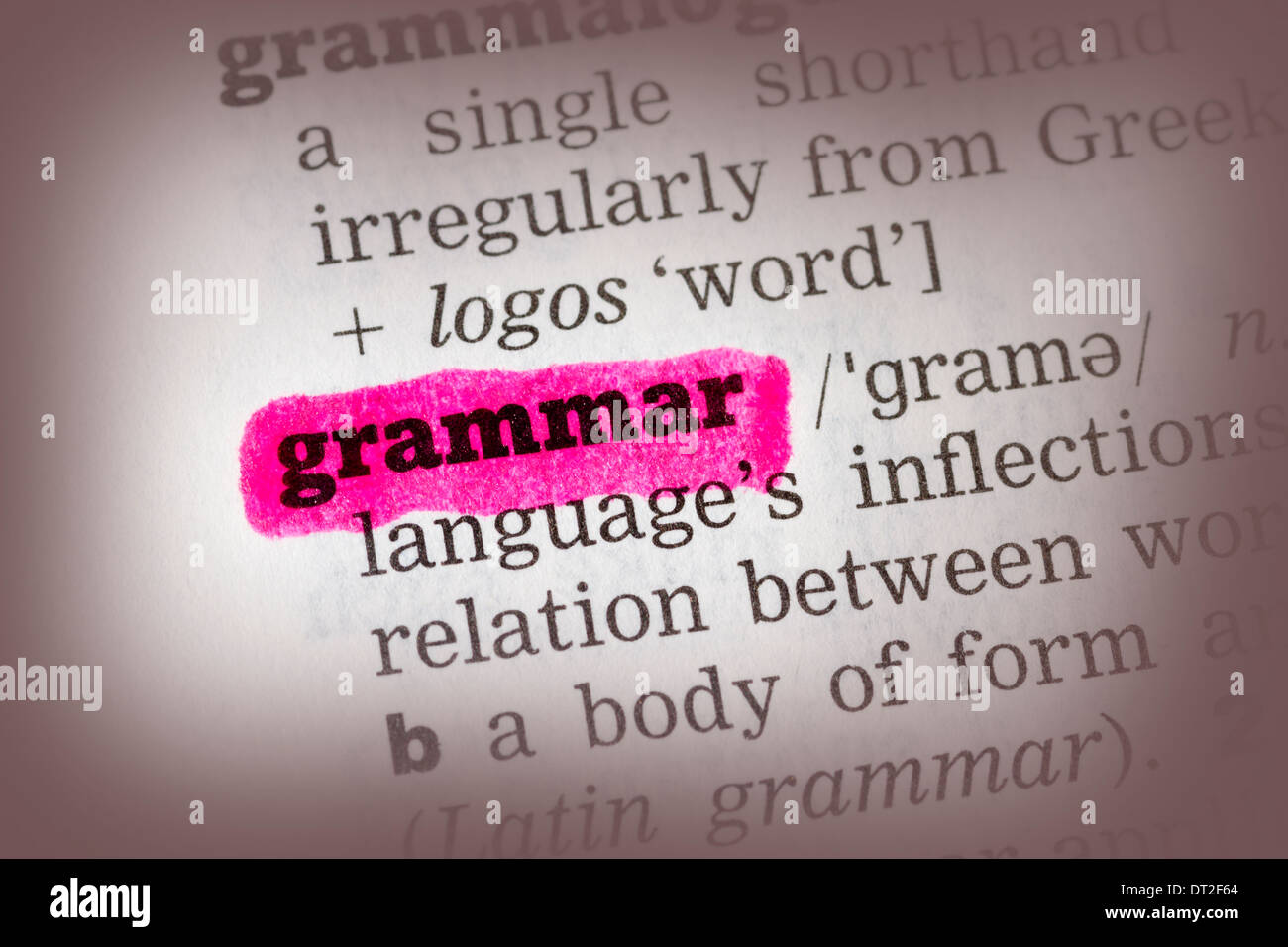 Grammar Dictionary Definition closeup highlighted in pink Stock Photo ...