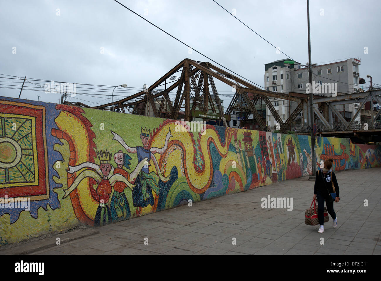 A 4km wall decorated in ceramics leads beneath the iconic Long Bien ...