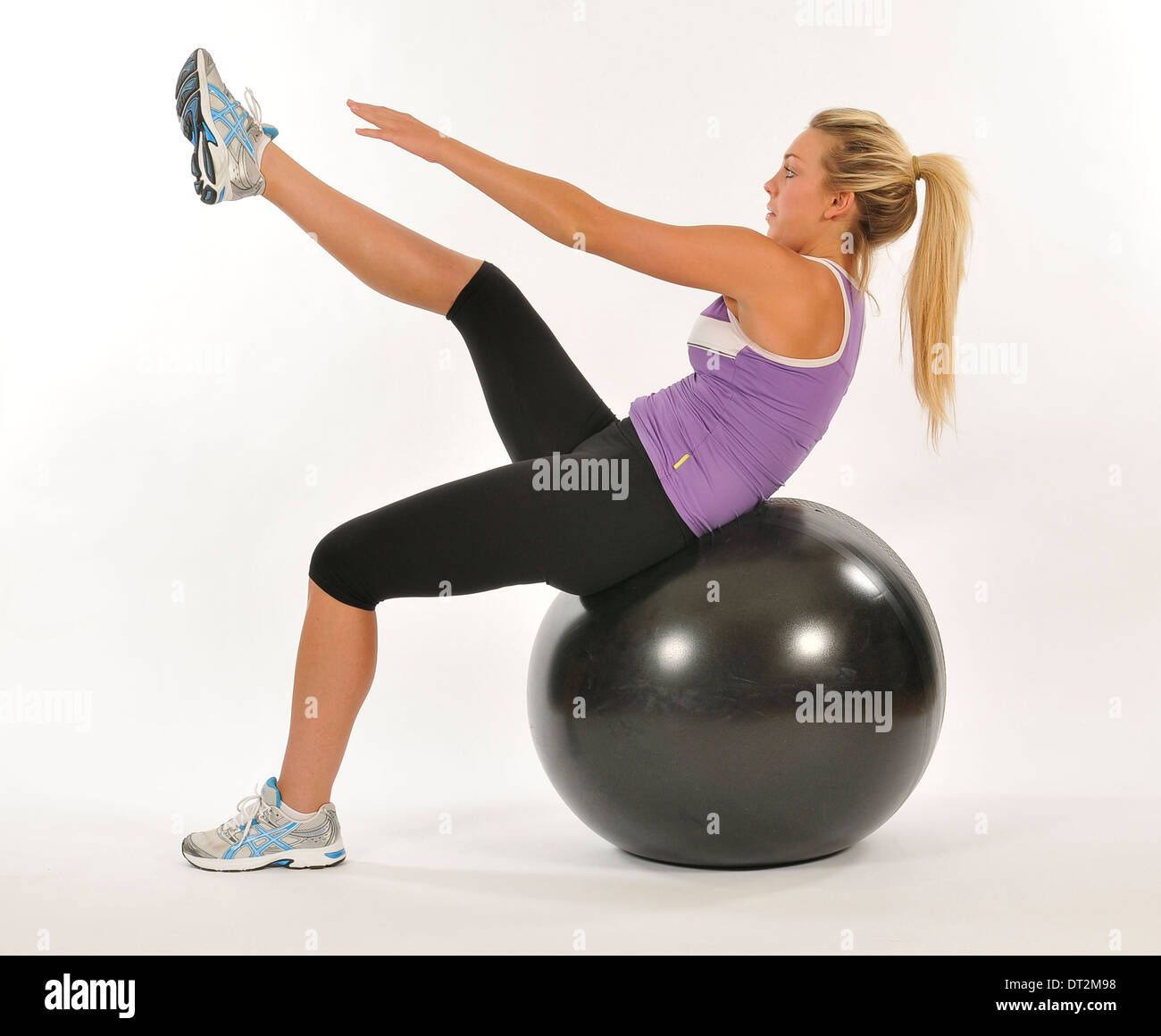 Exercise on fit ball to increase strength and core stability Stock ...