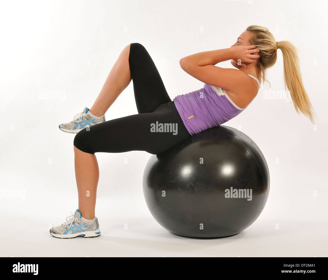 Exercise on fit ball to increase strength and core stability Stock ...
