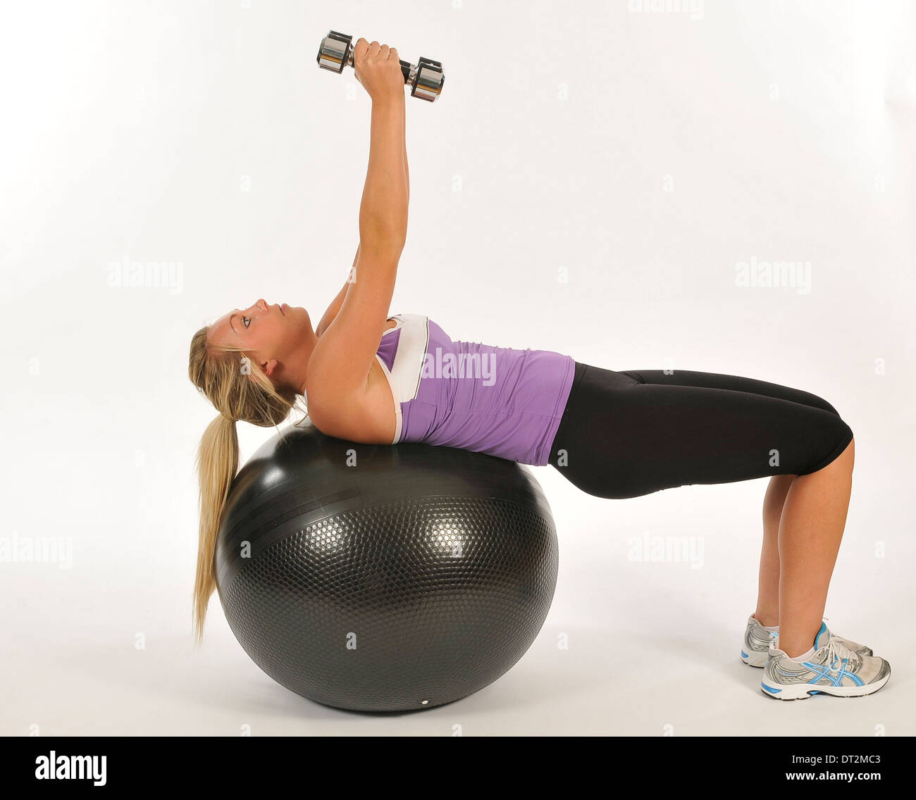 Exercise on fit ball to increase strength and core stability Stock ...