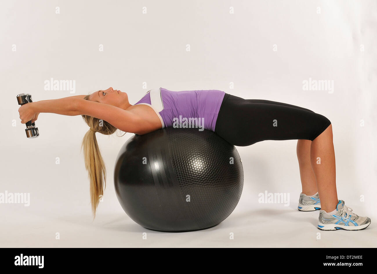 Exercise on fit ball to increase strength and core stability Stock ...
