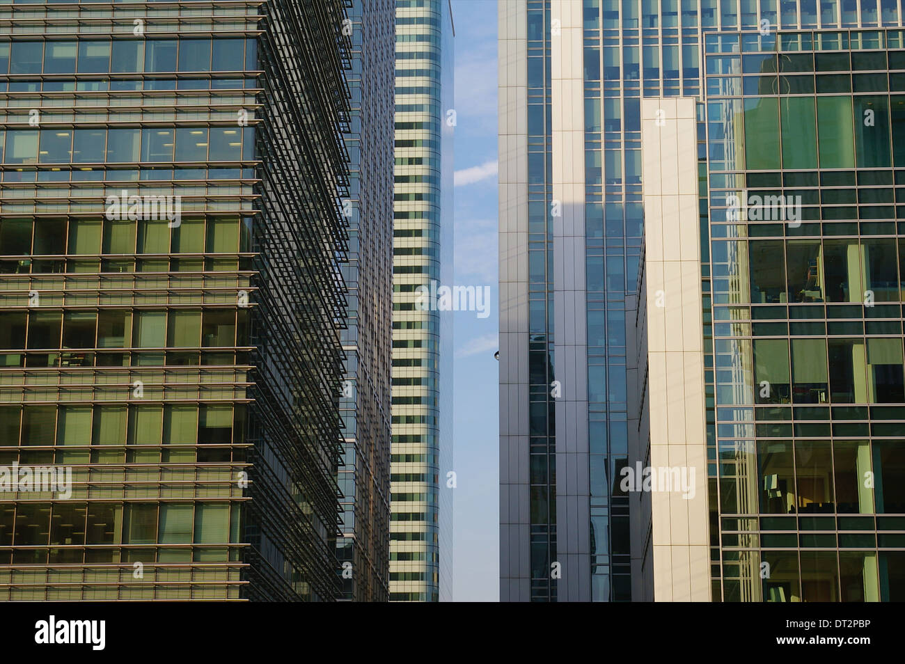 A single stripe of blue skye between office buildings in Canary wharf ...