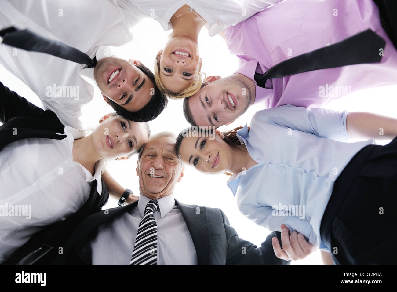 Heads together white background hi-res stock photography and images - Alamy
