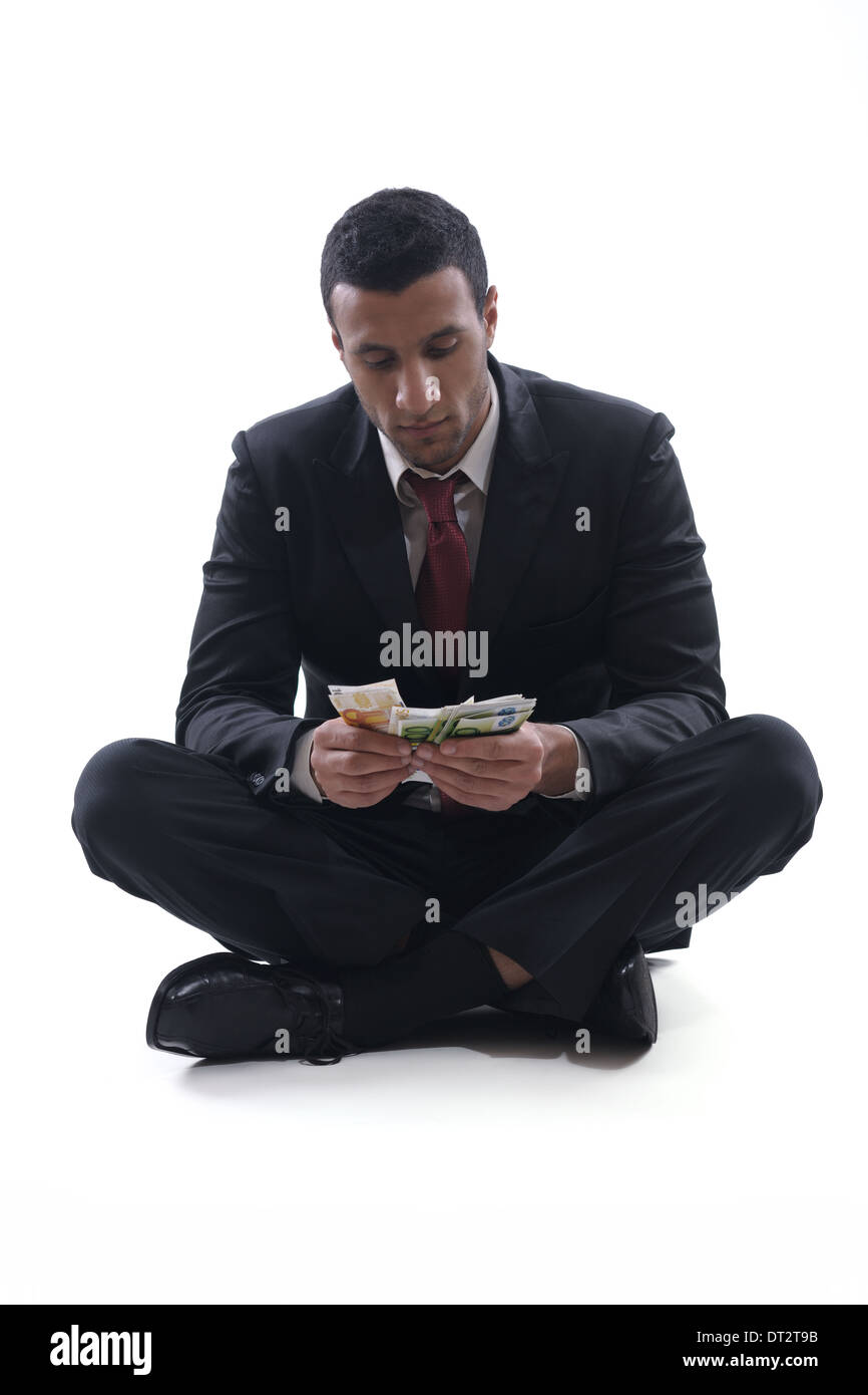 Arab man money Cut Out Stock Images & Pictures - Alamy