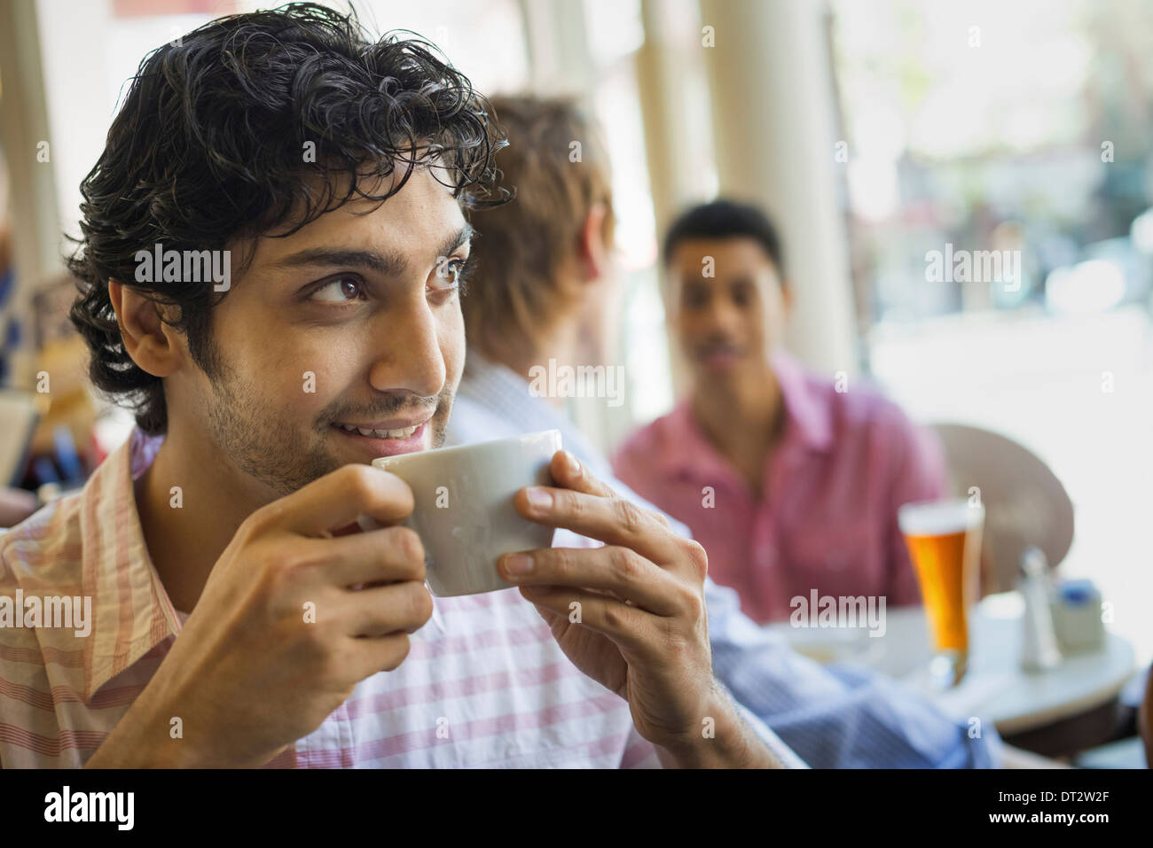Young men drinking bar new york hi-res stock photography and images - Alamy