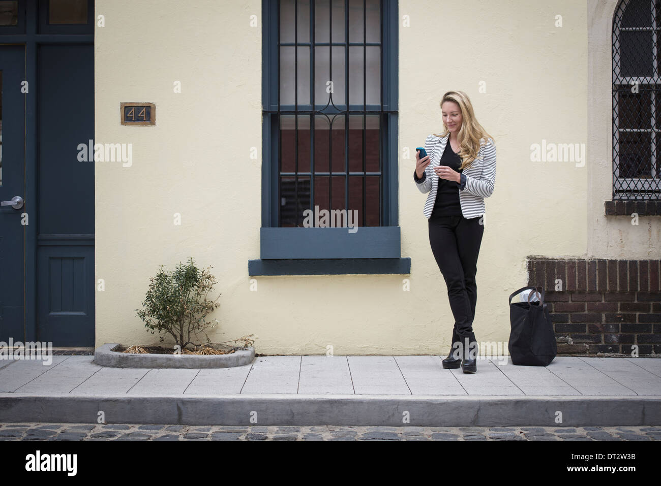 Woman getting dressed for work hi-res stock photography and images - Alamy