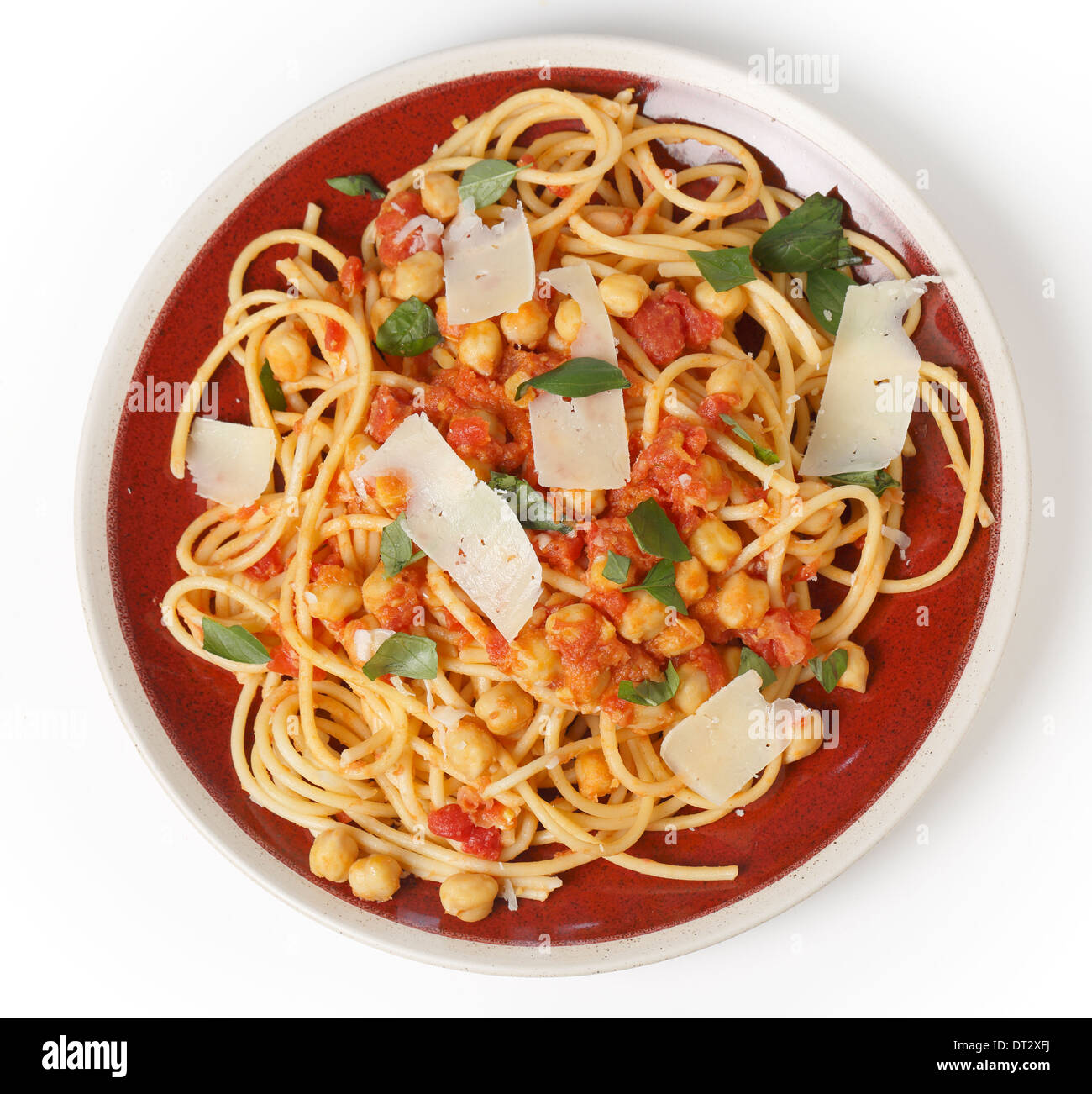 Spaghetti with a chickpea, tomato and chilli flakes sauce, garnished ...