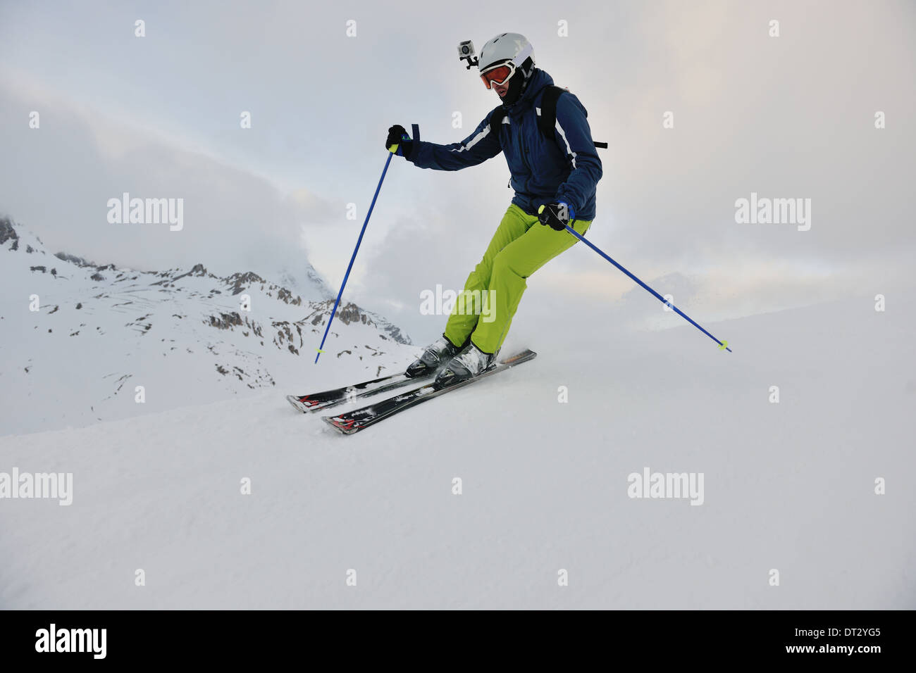 skiing on fresh snow at winter season at beautiful sunny day Stock ...