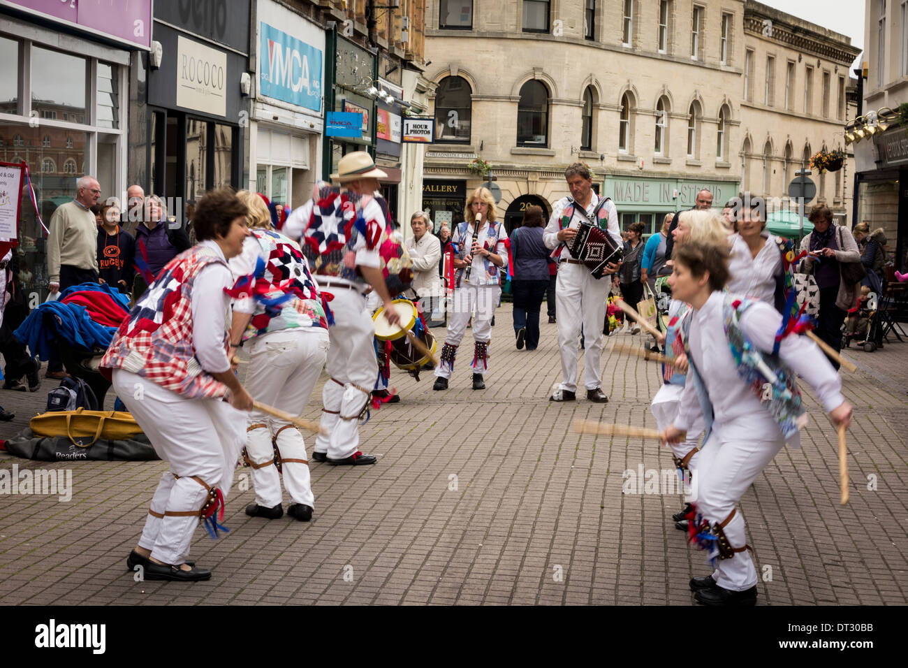 Morris dancers performing in the town centre of Stroud, Gloucestersnire ...