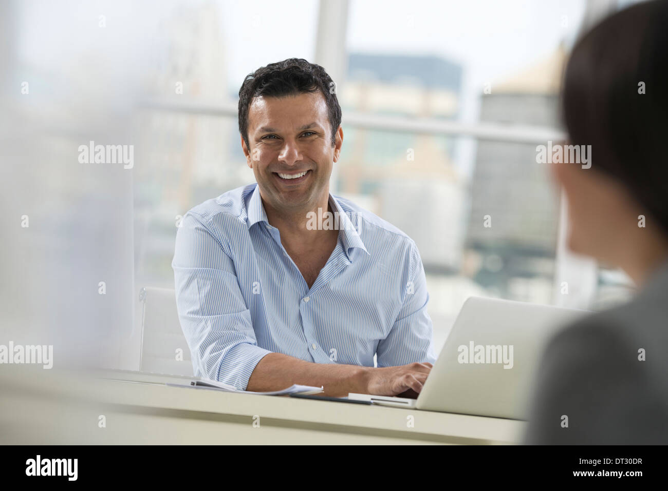 Man and woman across a table hi-res stock photography and images - Alamy