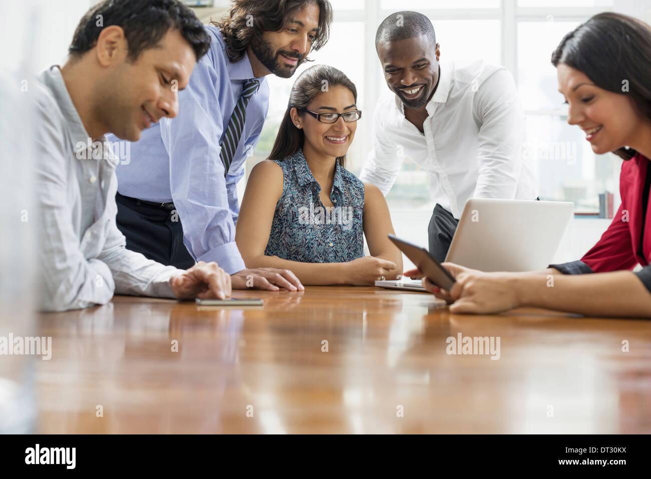 Team of five hi-res stock photography and images - Alamy