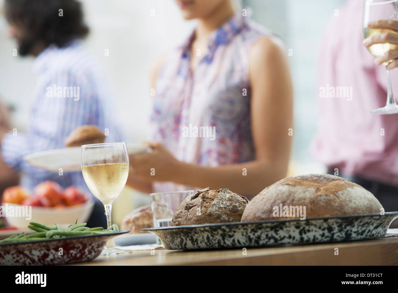 An open plan office A working lunch a salad buffet of mixed ages and ...