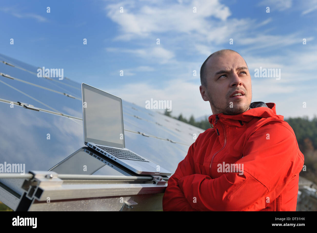 engineer using laptop at solar panels plant field Stock Photo - Alamy