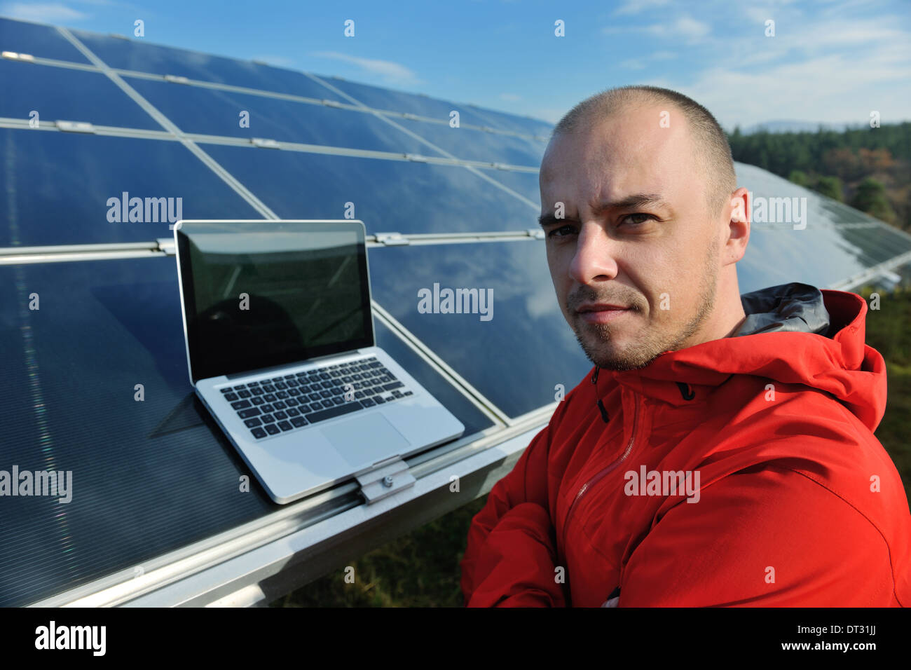 engineer using laptop at solar panels plant field Stock Photo - Alamy
