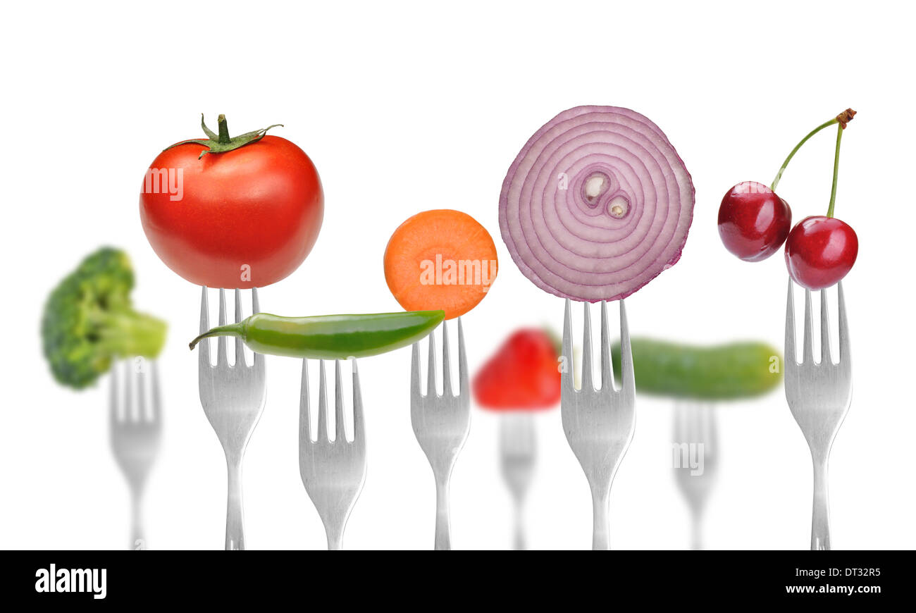 vegetables and fruits on the collection of forks, diet concept Stock ...