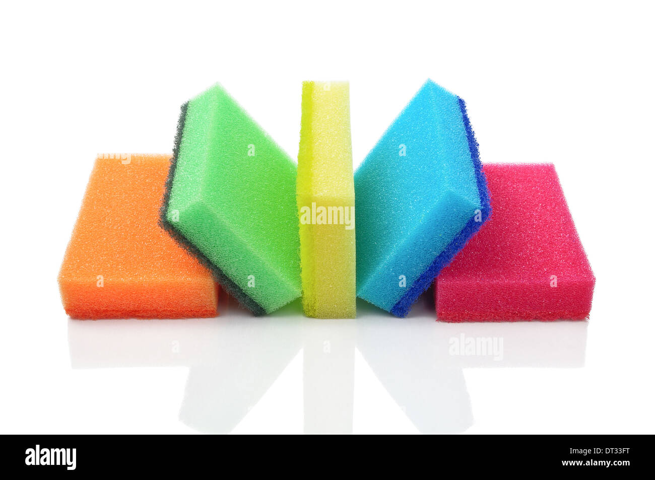 Five multi-colorful kitchen sponges for ware washing on a white ...