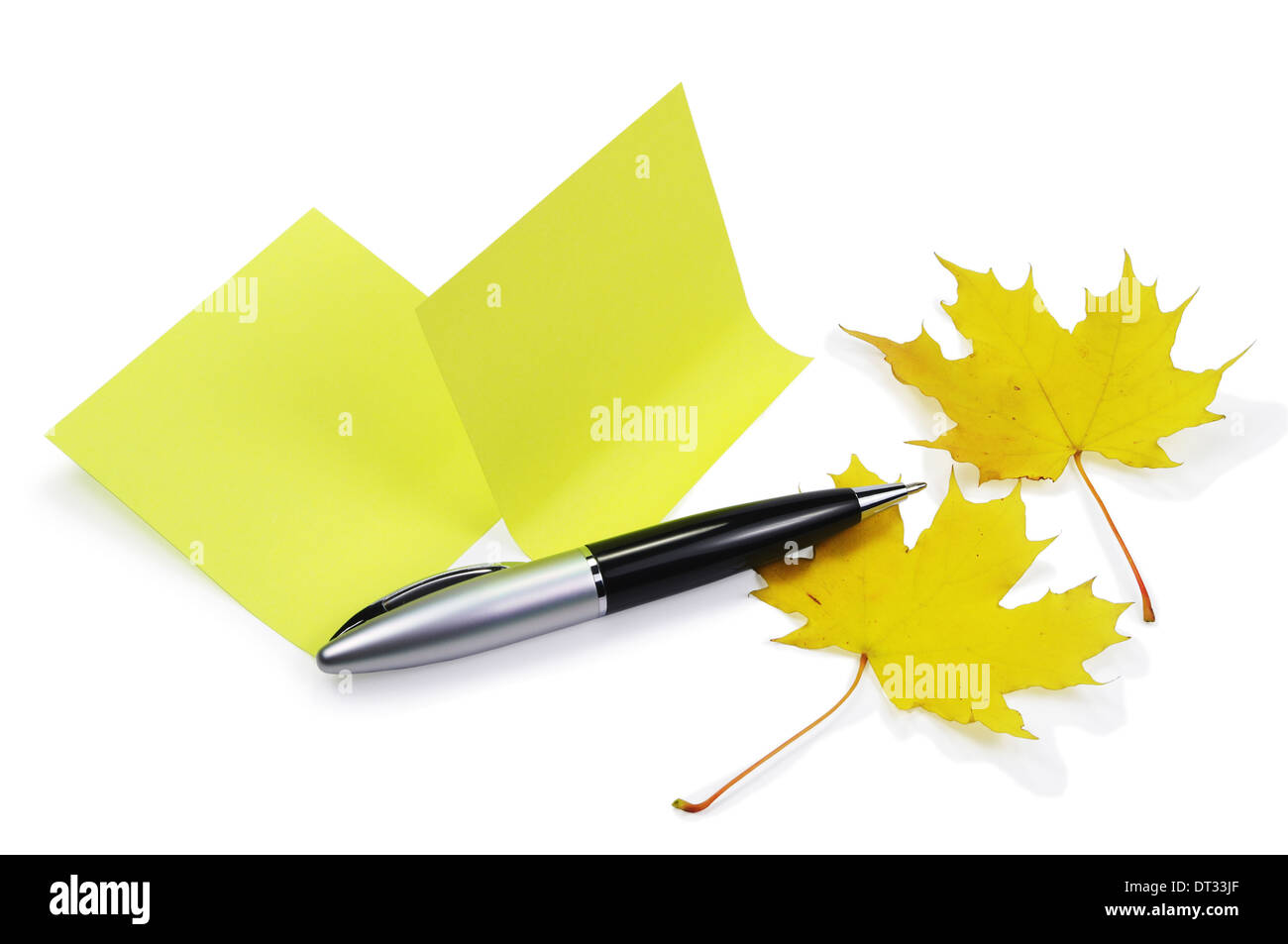 Yellow note and pen on white background Stock Photo - Alamy