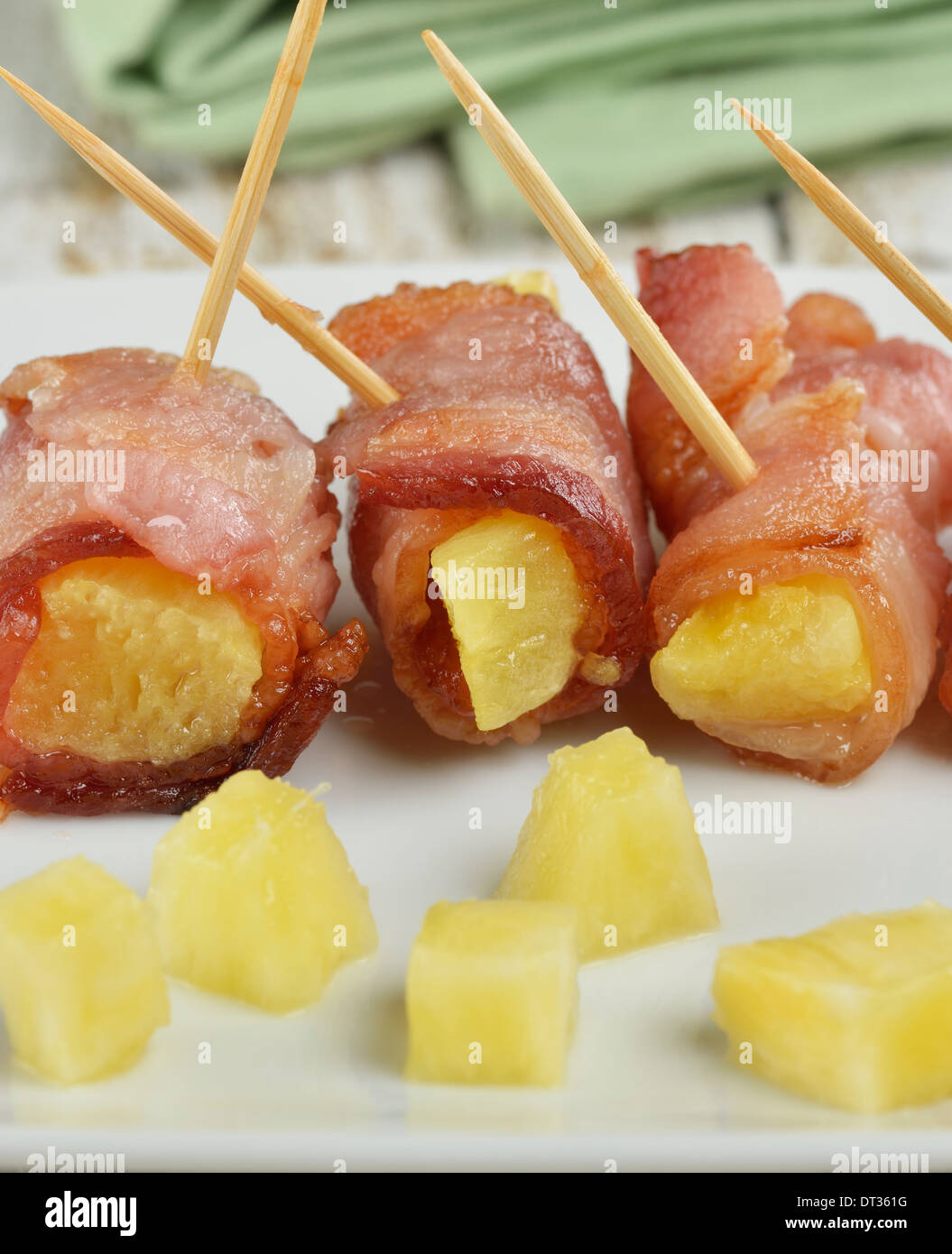 Bacon And Pineapple Appetizer Rolls Stock Photo - Alamy