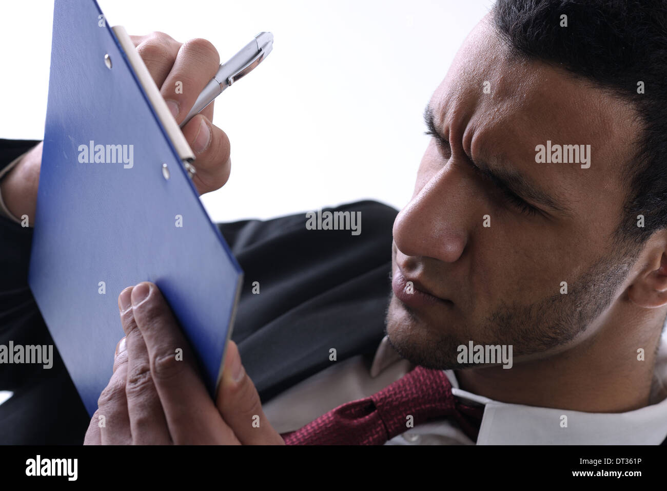 business man trying to read Stock Photo - Alamy
