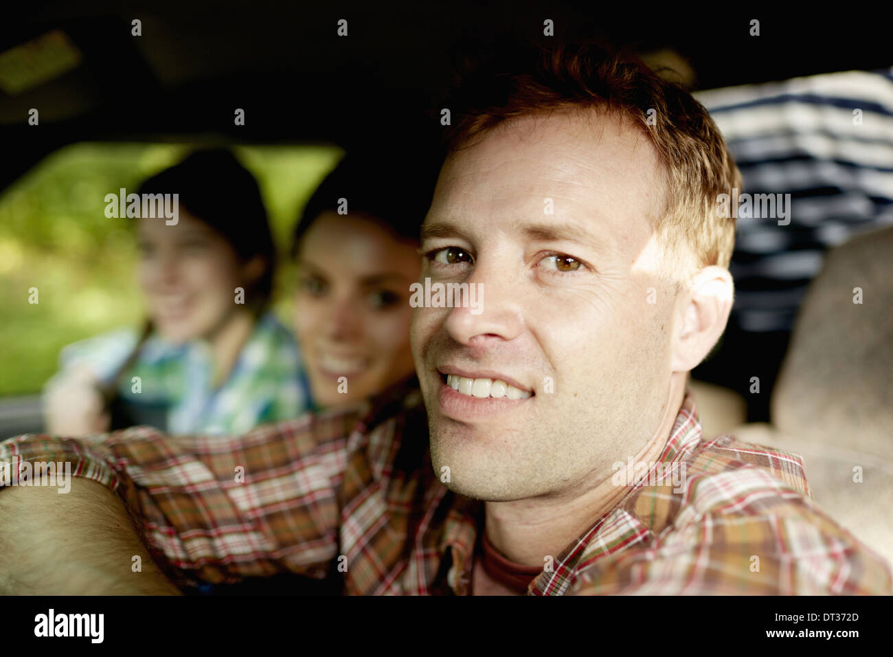 Three passengers in the cab of a pickup truck Stock Photo - Alamy
