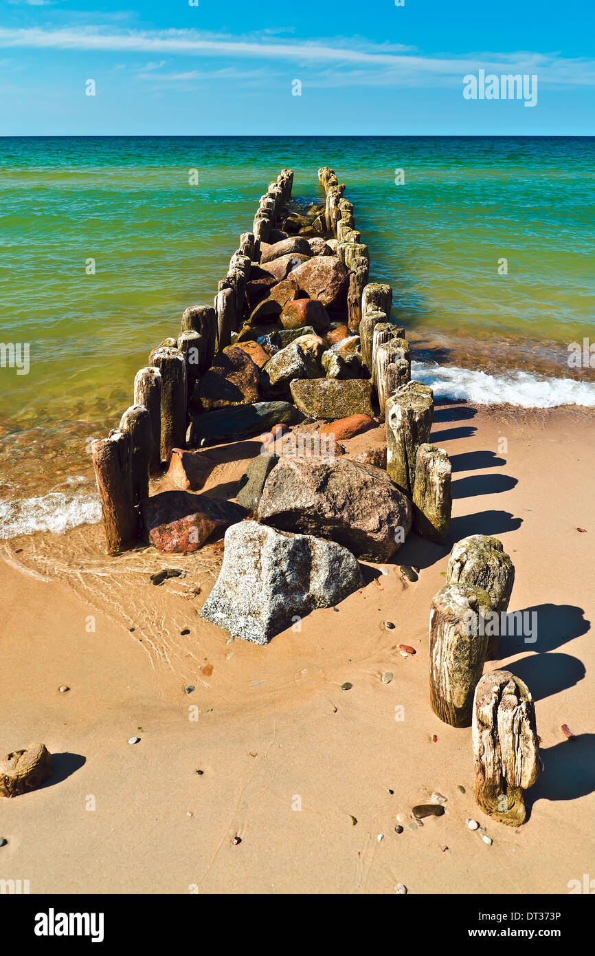 Beach, sea, breakwater Stock Photo - Alamy