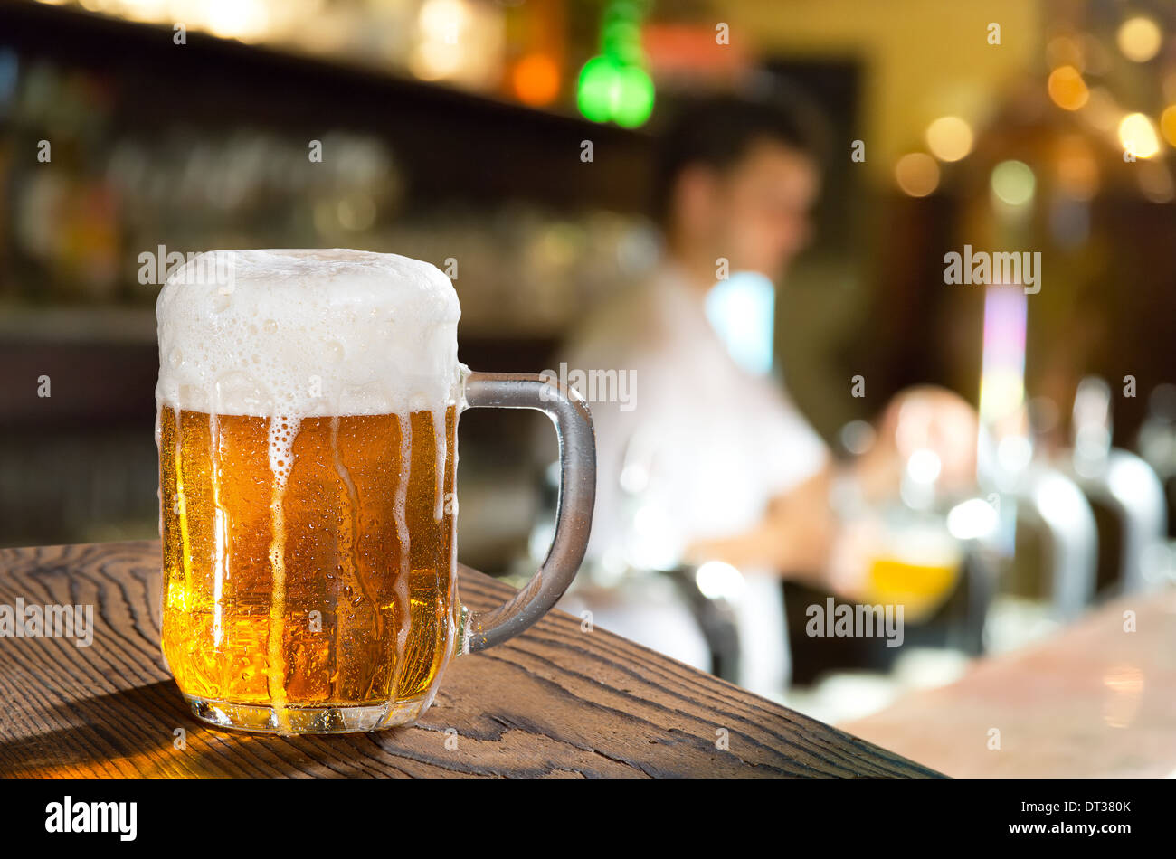 a glass of beer in the pub Stock Photo - Alamy