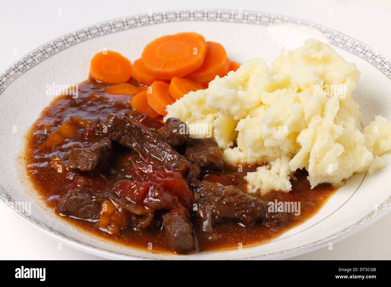British beef and tomato casserole, served with mashed potatoes and ...