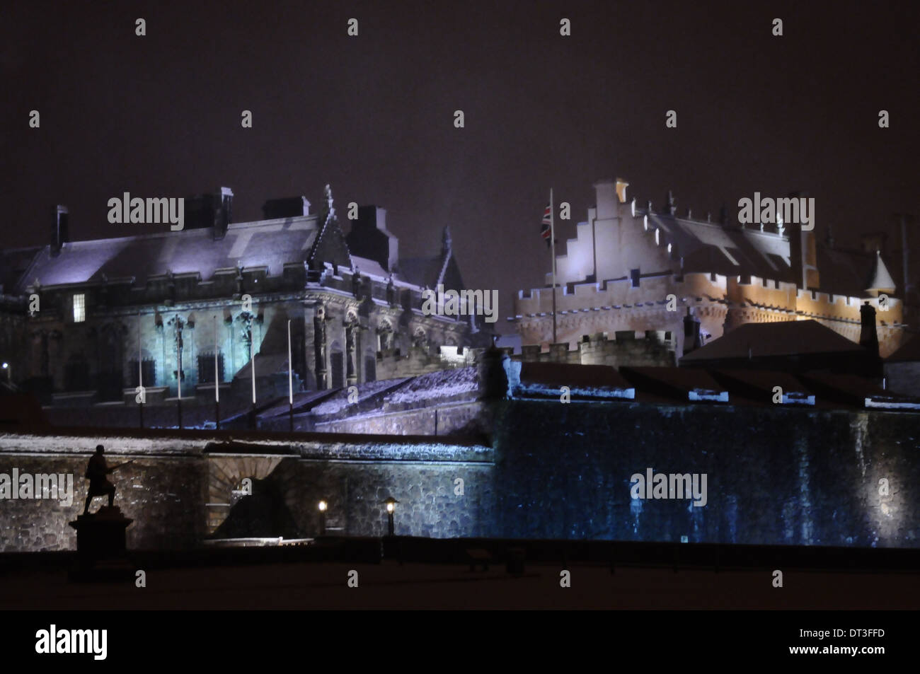 Stirling castle during the winter at night time during a winter snow ...