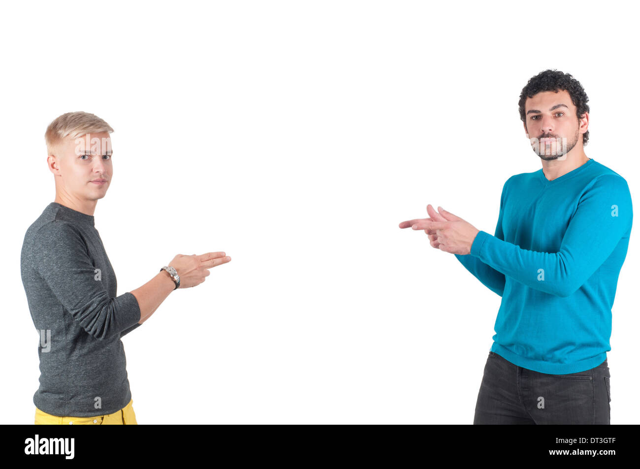 Two white male pointing with their fingers Stock Photo - Alamy