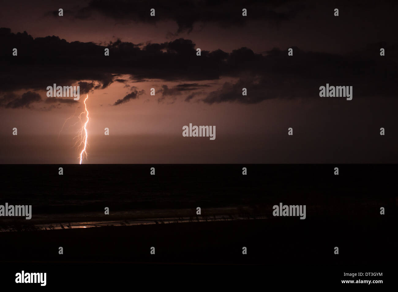 Lightning strike over ocean amelia hi-res stock photography and images ...
