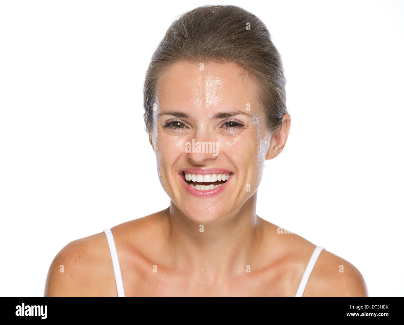 Portrait of smiling young woman with wet face Stock Photo - Alamy