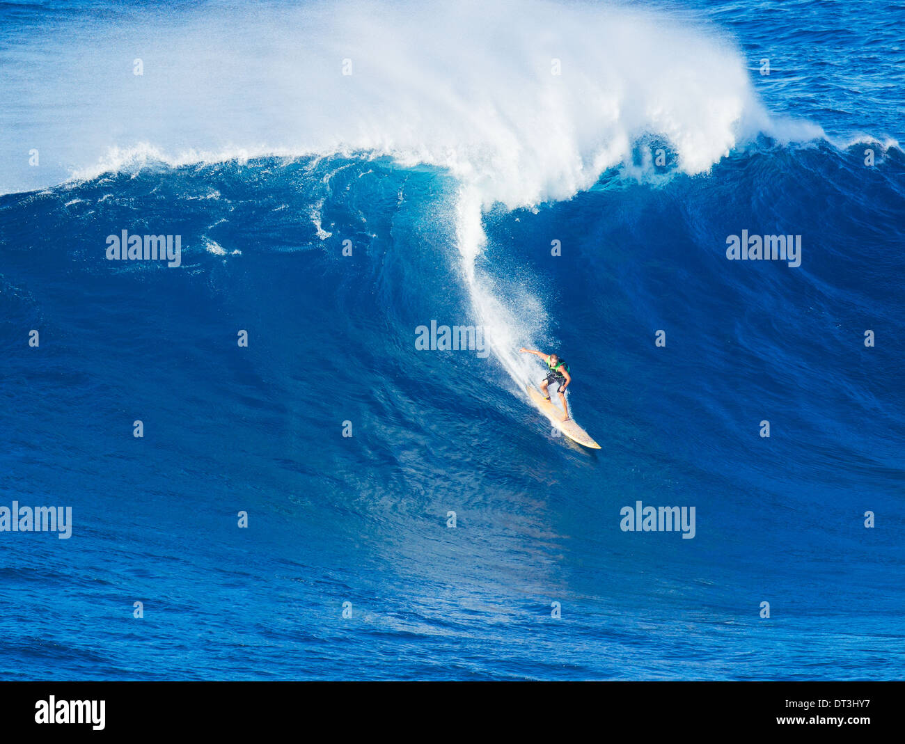 Extreme surfer riding giant wave Stock Photo - Alamy