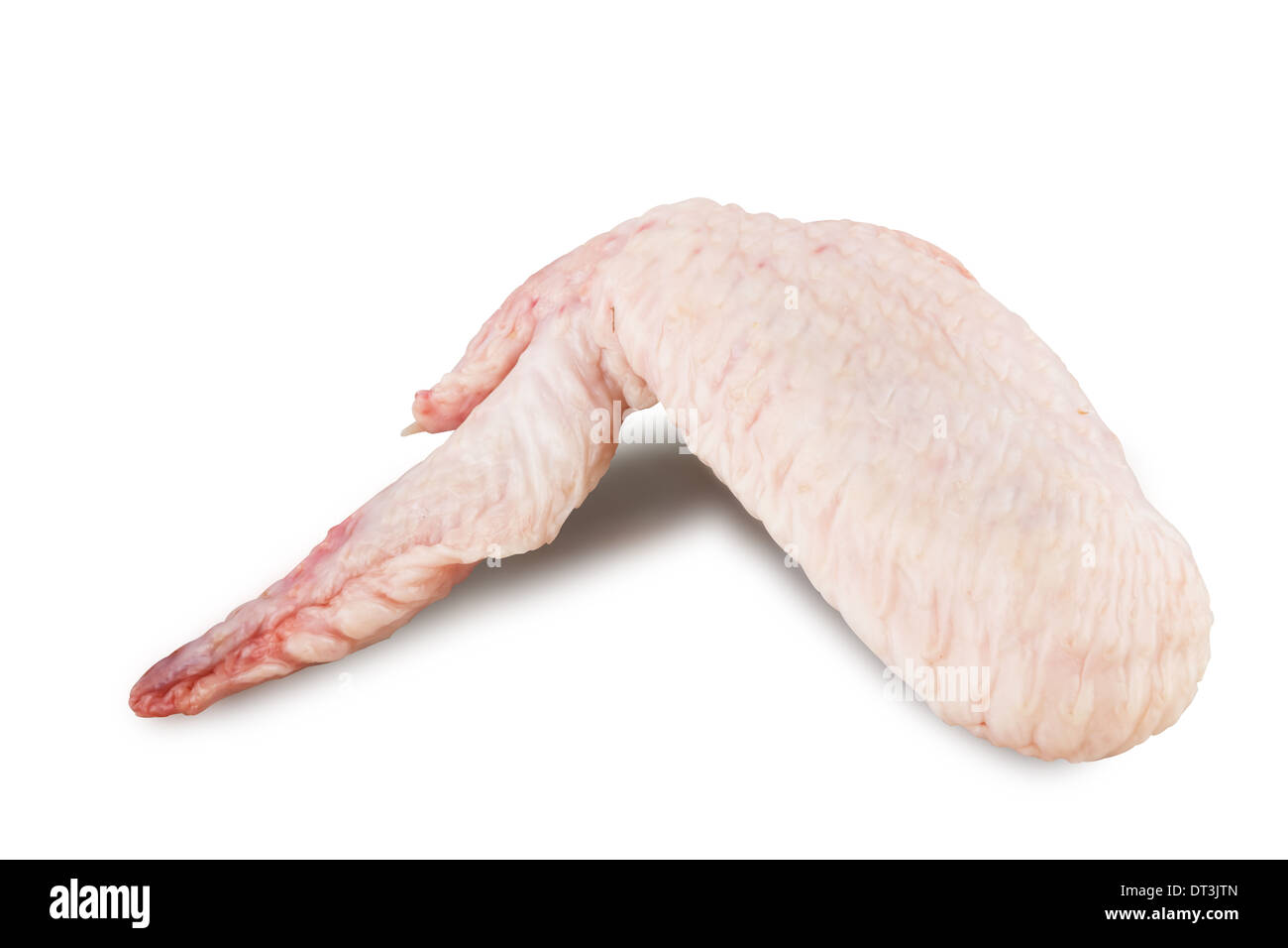 a raw chicken wing isolated on white. Clipping path included Stock ...