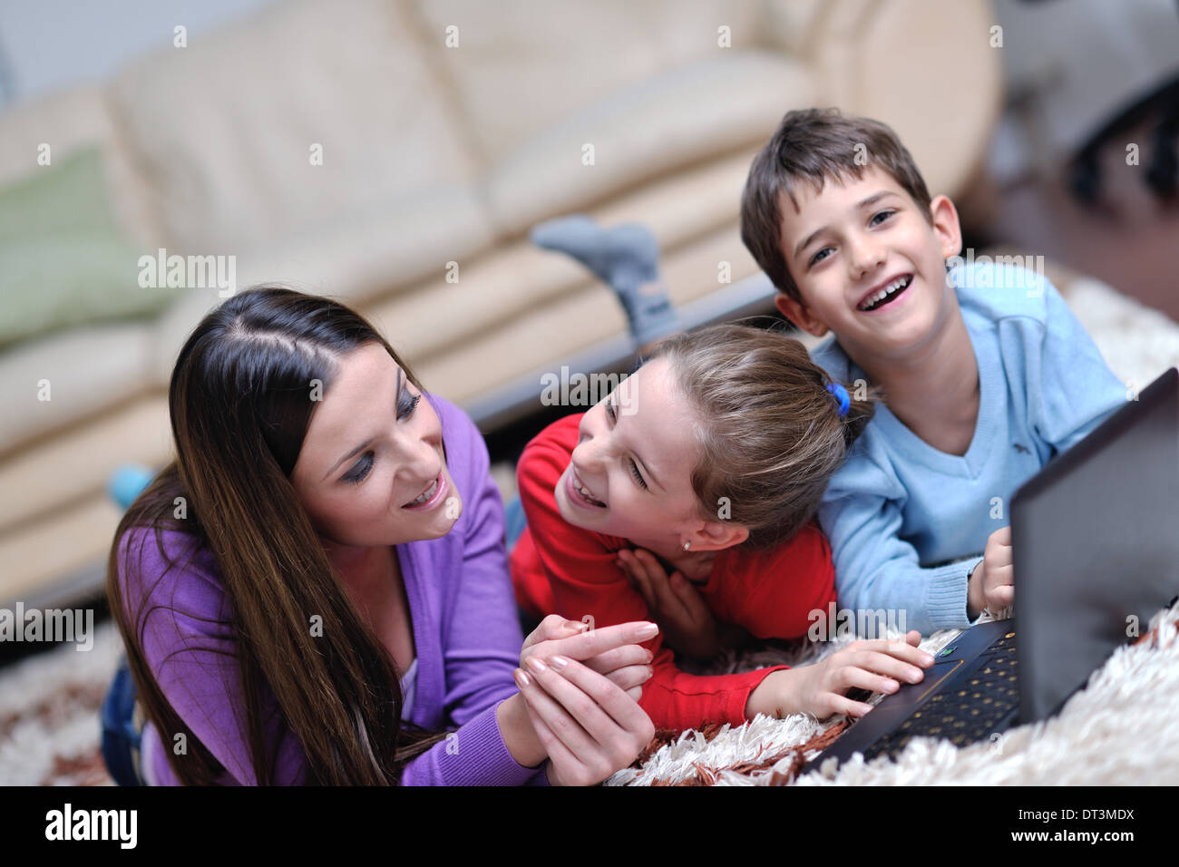 happy young family have fun at home Stock Photo - Alamy