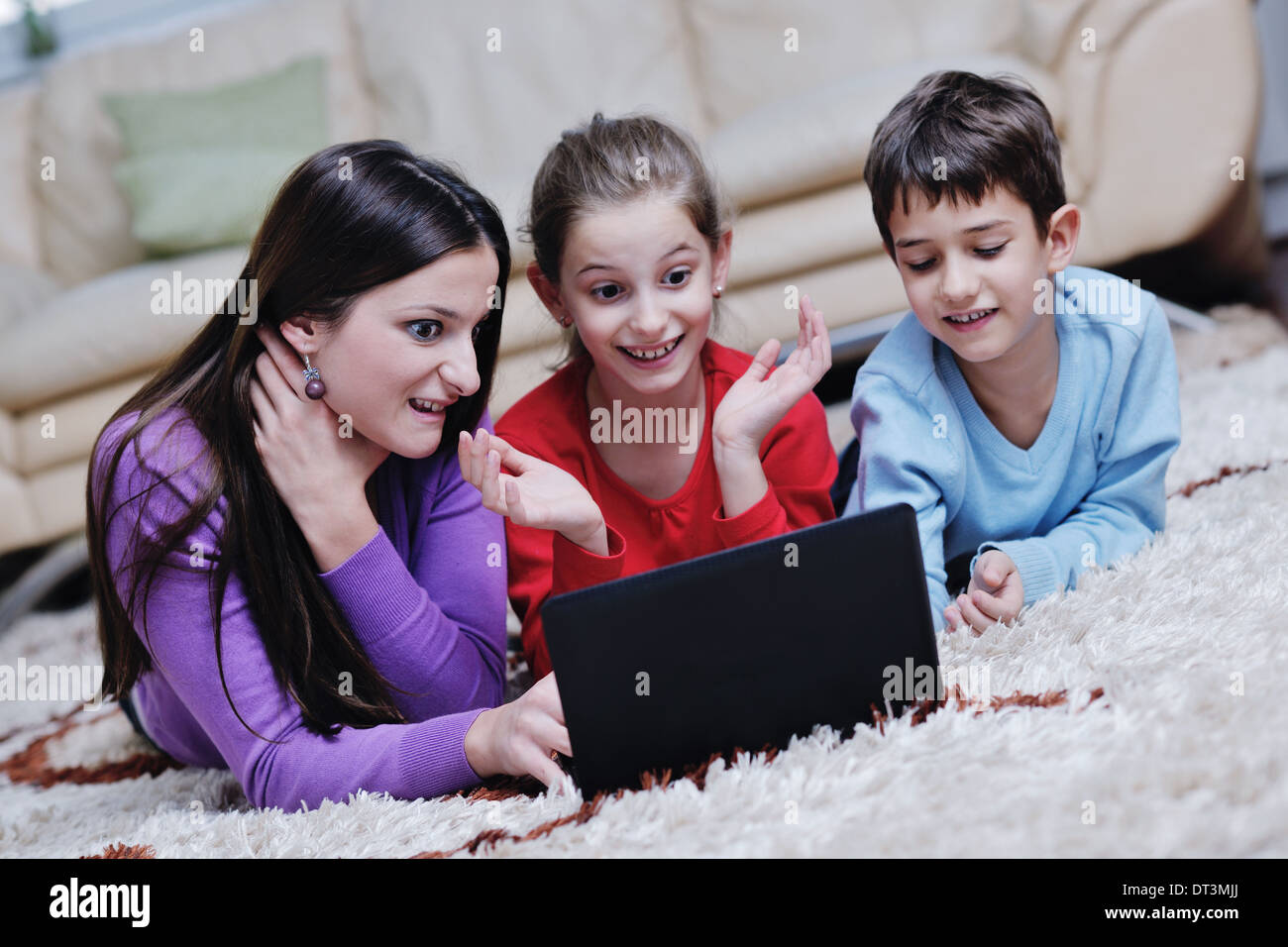 happy young family have fun at home Stock Photo - Alamy